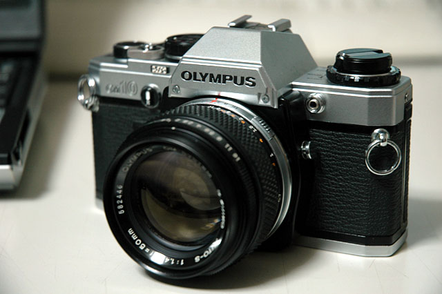 OLYMPUS OM-10: team - L E O S